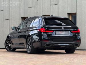 Black BMW 540 2023 in Riga, with an engine capacity of 3.00 L and mileage of 169 thousand km for 31000 €, photo 4 on AUTOMOTO.COM.LV