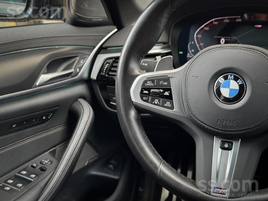 Black BMW 540 2023 in Riga, with an engine capacity of 3.00 L and mileage of 169 thousand km for 31000 €, photo 11 on AUTOMOTO.COM.LV