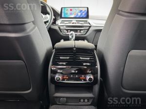 Black BMW 540 2023 in Riga, with an engine capacity of 3.00 L and mileage of 169 thousand km for 31000 €, photo 16 on AUTOMOTO.COM.LV