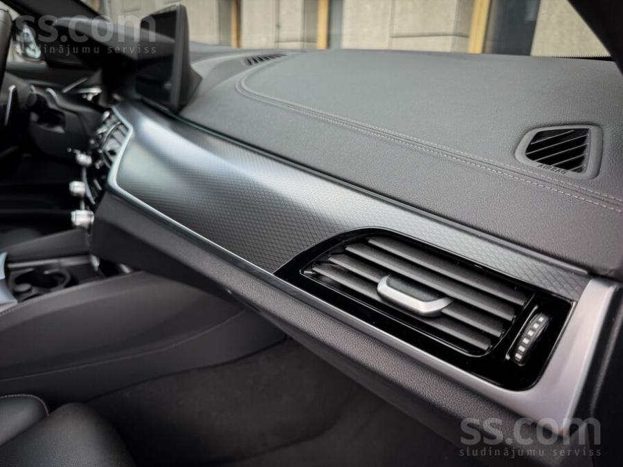 Black BMW 540 2023 in Riga, with an engine capacity of 3.00 L and mileage of 169 thousand km for 31000 €, photo 21 on AUTOMOTO.COM.LV
