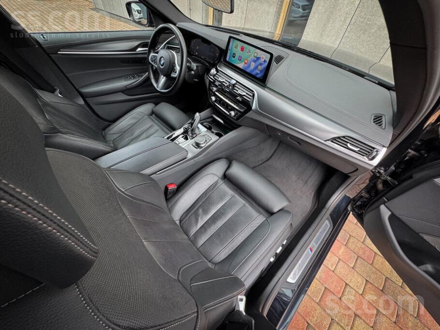Black BMW 540 2023 in Riga, with an engine capacity of 3.00 L and mileage of 169 thousand km for 31000 €, photo 31 on AUTOMOTO.COM.LV