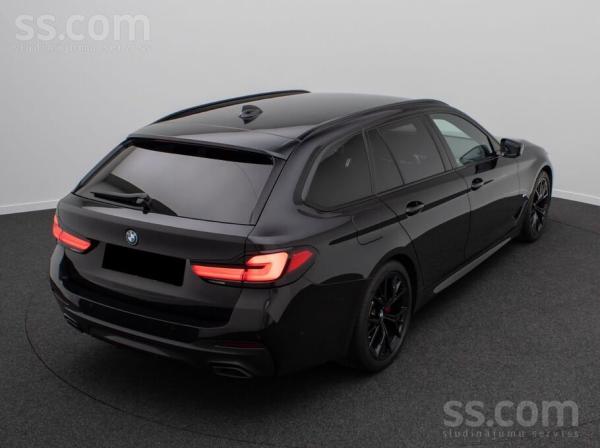 Black BMW 540 2023 in Tukums, with an engine capacity of 3.00 L and mileage of 166 thousand km for 33777 €, photo 2 on AUTOMOTO.COM.LV
