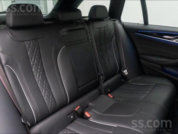 Black BMW 540 2023 in Tukums, with an engine capacity of 3.00 L and mileage of 166 thousand km for 33777 €, photo 5 on AUTOMOTO.COM.LV