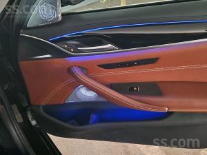 Brown BMW 540 2018 in Riga, with an engine capacity of 3.00 L and mileage of 254 thousand km for 25000 €, photo 13 on AUTOMOTO.COM.LV