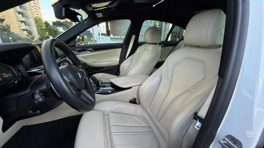 White BMW 540 2017 in Vilnius, with an engine capacity of 3.00 L and mileage of 140 thousand km for 25500 €, photo 14 on AUTOMOTO.COM.LV