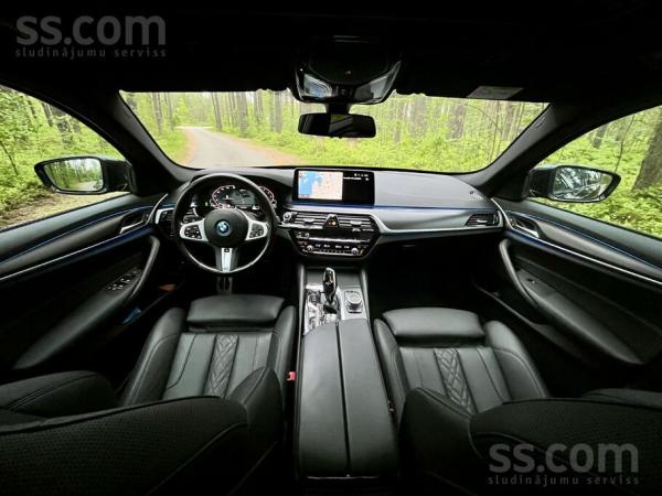 Black BMW 545 2022 in Riga, with an engine capacity of 3.00 L and mileage of 158 thousand km for 39900 €, photo 7 on AUTOMOTO.COM.LV