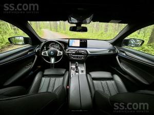 Black BMW 545 2022 in Riga, with an engine capacity of 3.00 L and mileage of 158 thousand km for 39900 €, photo 8 on AUTOMOTO.COM.LV