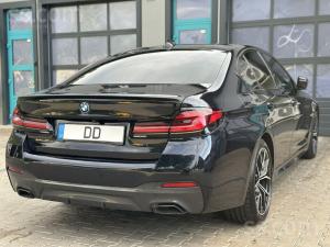Black BMW 545 2022 in Riga, with an engine capacity of 3.00 L and mileage of 89 thousand km for 42900 €, photo 4 on AUTOMOTO.COM.LV