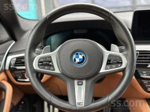 Black BMW 545 2022 in Riga, with an engine capacity of 3.00 L and mileage of 89 thousand km for 42900 €, photo 12 on AUTOMOTO.COM.LV