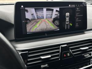 Grey BMW 545 2021 in Kaunas, with an engine capacity of 3.00 L and mileage of 130 thousand km for 34771 €, photo 24 on AUTOMOTO.COM.LV