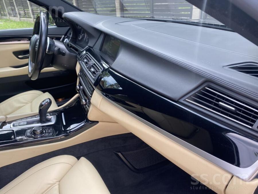 Black BMW 550 2012 in Riga, with an engine capacity of 3.00 L and mileage of 135 thousand km for 15900 €, photo 15 on AUTOMOTO.COM.LV