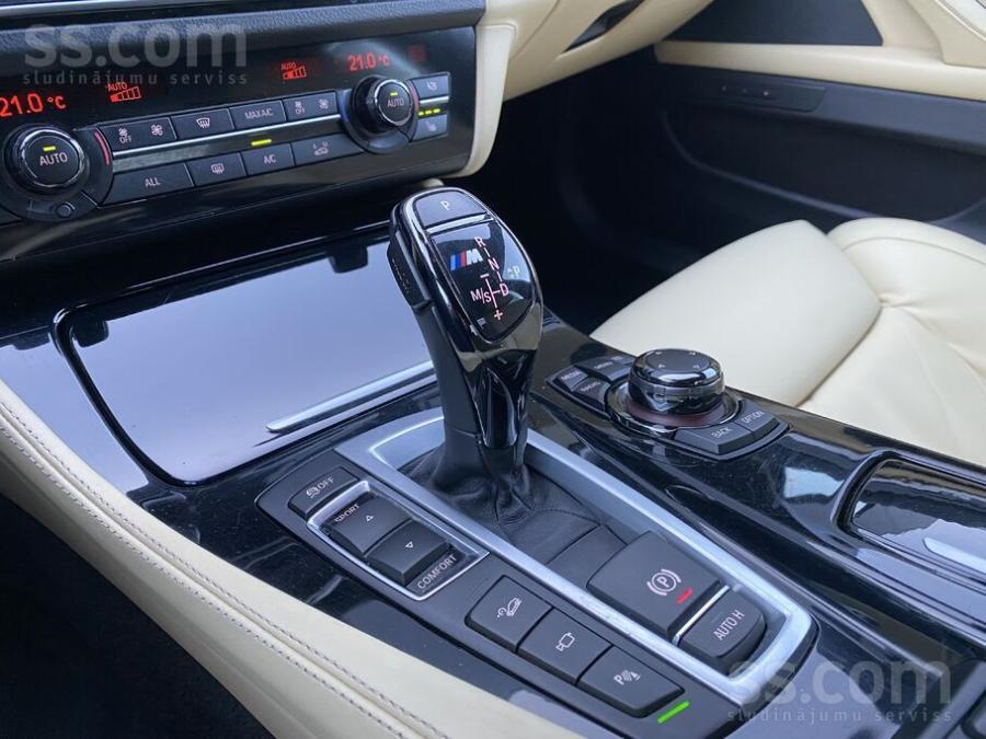 Black BMW 550 2012 in Riga, with an engine capacity of 3.00 L and mileage of 135 thousand km for 15900 €, photo 17 on AUTOMOTO.COM.LV