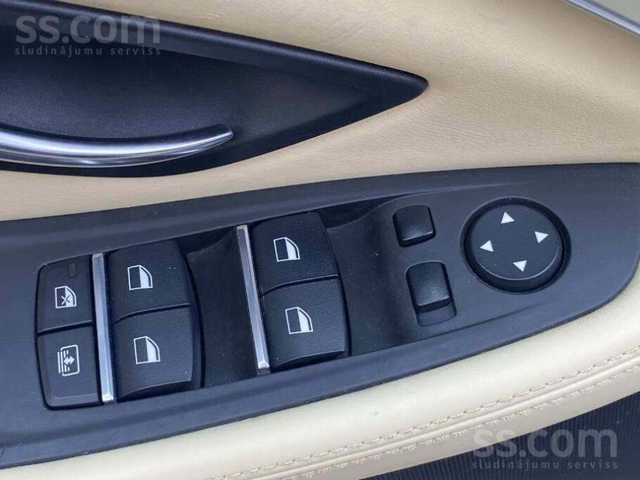Black BMW 550 2012 in Riga, with an engine capacity of 3.00 L and mileage of 135 thousand km for 15900 €, photo 31 on AUTOMOTO.COM.LV
