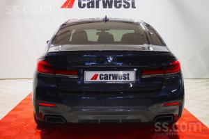 Black BMW 550 2021 in Riga, with an engine capacity of 4.40 L and mileage of 104 thousand km for 48490 €, photo 6 on AUTOMOTO.COM.LV