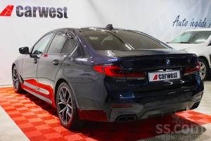 Black BMW 550 2021 in Riga, with an engine capacity of 4.40 L and mileage of 104 thousand km for 48490 €, photo 7 on AUTOMOTO.COM.LV
