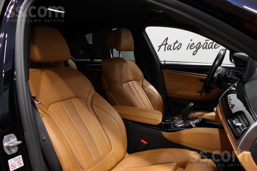 Black BMW 550 2021 in Riga, with an engine capacity of 4.40 L and mileage of 104 thousand km for 48490 €, photo 25 on AUTOMOTO.COM.LV