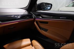 Black BMW 550 2021 in Riga, with an engine capacity of 4.40 L and mileage of 104 thousand km for 48490 €, photo 30 on AUTOMOTO.COM.LV