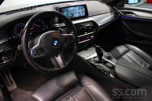 Black BMW 550 2019 in Riga, with an engine capacity of 3.00 L and mileage of 186 thousand km for 29900 €, photo 13 on AUTOMOTO.COM.LV