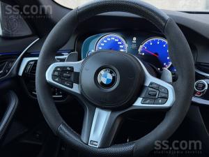 Blue BMW 550 2017 in Riga, with an engine capacity of 4.40 L and mileage of 179 thousand km for 29980 €, photo 20 on AUTOMOTO.COM.LV