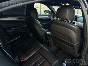 Blue BMW 550 2018 in Jelgava, with an engine capacity of 3.00 L and mileage of 199 thousand km for 31000 €, photo 14 on AUTOMOTO.COM.LV