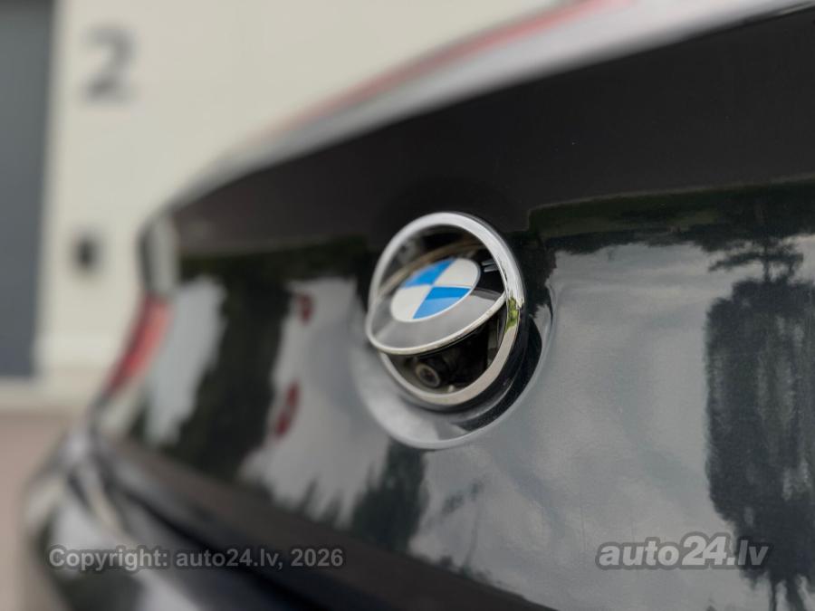 Black BMW 6 Series 2012 in Tallinn, with an engine capacity of 3.00 L and mileage of 171 thousand km for 16250 €, photo 25 on AUTOMOTO.COM.LV