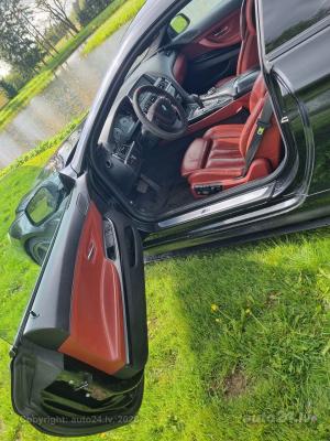 Melns BMW 6 Series 2012 Tallina, ar dzinēja tilpumu 3.00 L un nobraukumu 260 tūkst. km par 18184 €, foto 10 vietnē AUTOMOTO.COM.LV