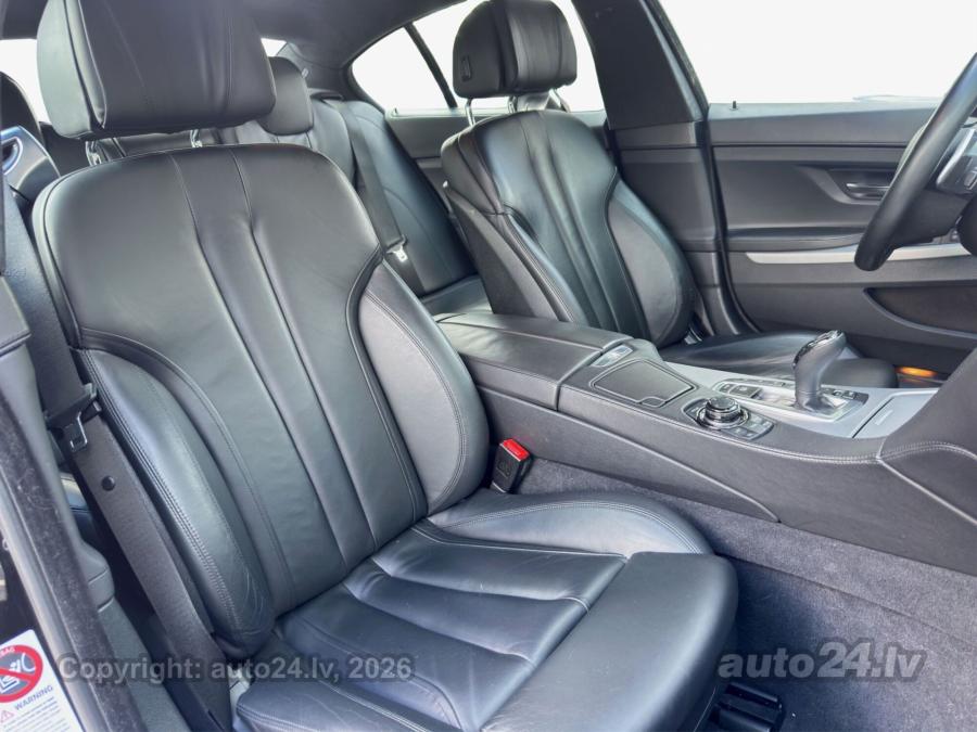 Black BMW 6 Series 2013 in Riga, with an engine capacity of 4.40 L and mileage of 69 thousand km for 29990 €, photo 7 on AUTOMOTO.COM.LV