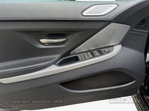 Black BMW 6 Series 2013 in Riga, with an engine capacity of 4.40 L and mileage of 69 thousand km for 29990 €, photo 12 on AUTOMOTO.COM.LV