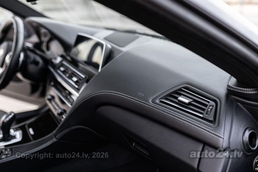 Melns BMW 6 Series 2014 Tallina, ar dzinēja tilpumu 3.00 L un nobraukumu 306 tūkst. km par 19500 €, foto 12 vietnē AUTOMOTO.COM.LV