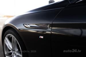 Melns BMW 6 Series 2014 Tallina, ar dzinēja tilpumu 3.00 L un nobraukumu 306 tūkst. km par 19500 €, foto 14 vietnē AUTOMOTO.COM.LV