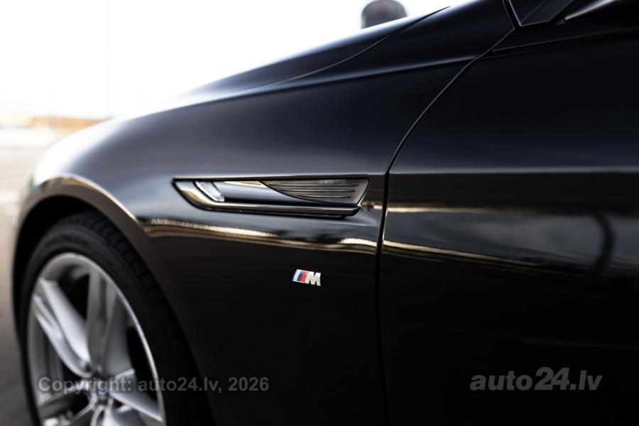 Melns BMW 6 Series 2014 Tallina, ar dzinēja tilpumu 3.00 L un nobraukumu 306 tūkst. km par 19500 €, foto 14 vietnē AUTOMOTO.COM.LV