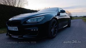 Black BMW 6 Series 2012 in Tallinn, with an engine capacity of 3.00 L and mileage of 305 thousand km for 18500 €, photo 7 on AUTOMOTO.COM.LV