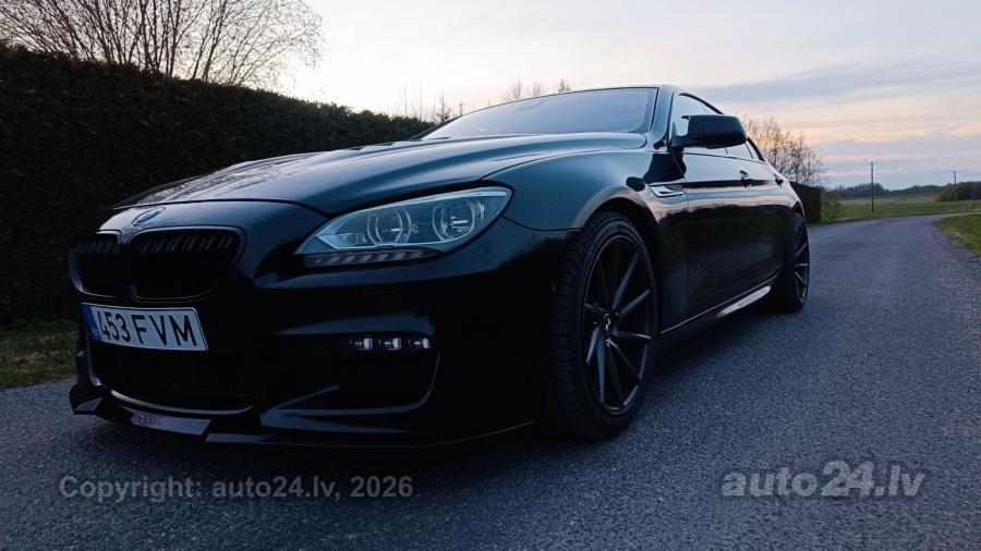 Black BMW 6 Series 2012 in Tallinn, with an engine capacity of 3.00 L and mileage of 305 thousand km for 18500 €, photo 7 on AUTOMOTO.COM.LV