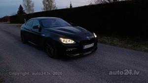 Black BMW 6 Series 2012 in Tallinn, with an engine capacity of 3.00 L and mileage of 305 thousand km for 18500 €, photo 9 on AUTOMOTO.COM.LV