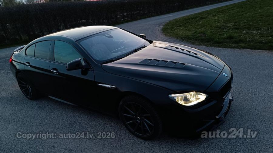 Black BMW 6 Series 2012 in Tallinn, with an engine capacity of 3.00 L and mileage of 305 thousand km for 18500 €, photo 10 on AUTOMOTO.COM.LV