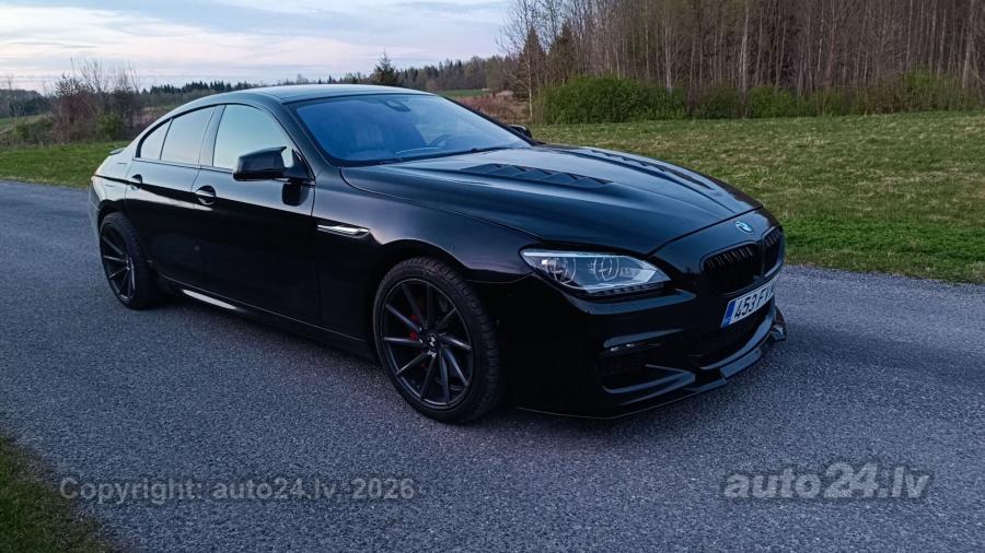 Black BMW 6 Series 2012 in Tallinn, with an engine capacity of 3.00 L and mileage of 305 thousand km for 18500 €, photo 11 on AUTOMOTO.COM.LV