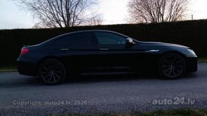Black BMW 6 Series 2012 in Tallinn, with an engine capacity of 3.00 L and mileage of 305 thousand km for 18500 €, photo 12 on AUTOMOTO.COM.LV