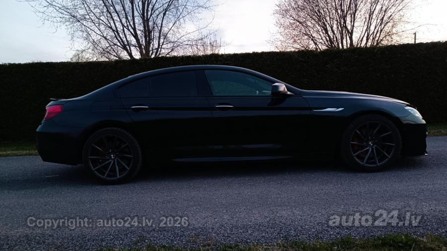 Black BMW 6 Series 2012 in Tallinn, with an engine capacity of 3.00 L and mileage of 305 thousand km for 18500 €, photo 12 on AUTOMOTO.COM.LV