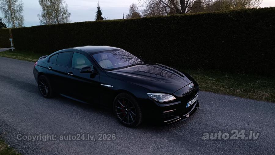 Black BMW 6 Series 2012 in Tallinn, with an engine capacity of 3.00 L and mileage of 305 thousand km for 18500 €, photo 13 on AUTOMOTO.COM.LV