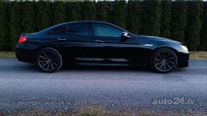 Black BMW 6 Series 2012 in Tallinn, with an engine capacity of 3.00 L and mileage of 305 thousand km for 18500 €, photo 14 on AUTOMOTO.COM.LV