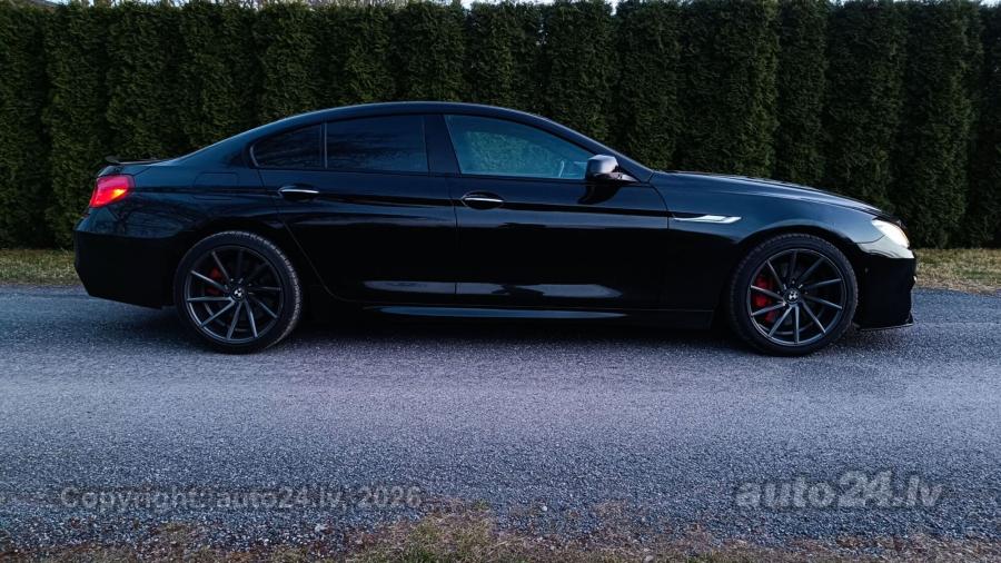 Black BMW 6 Series 2012 in Tallinn, with an engine capacity of 3.00 L and mileage of 305 thousand km for 18500 €, photo 14 on AUTOMOTO.COM.LV