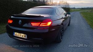 Black BMW 6 Series 2012 in Tallinn, with an engine capacity of 3.00 L and mileage of 305 thousand km for 18500 €, photo 17 on AUTOMOTO.COM.LV