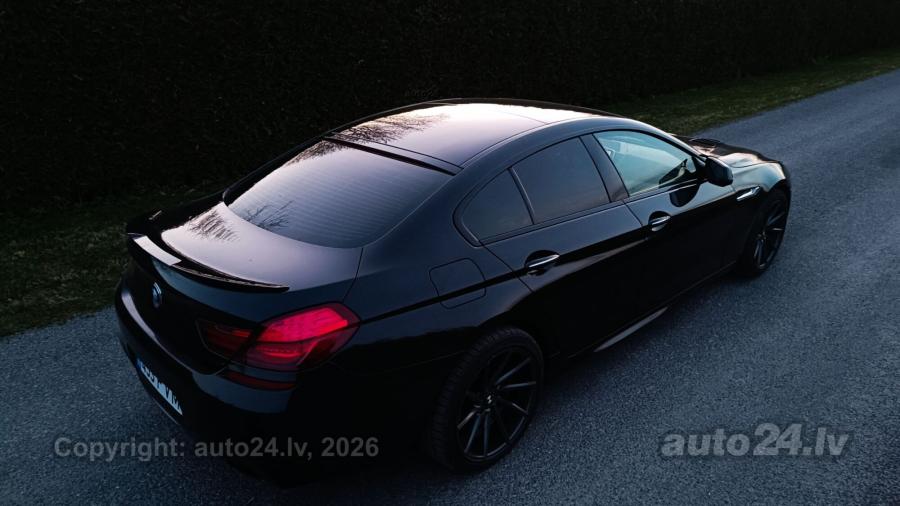 Black BMW 6 Series 2012 in Tallinn, with an engine capacity of 3.00 L and mileage of 305 thousand km for 18500 €, photo 18 on AUTOMOTO.COM.LV