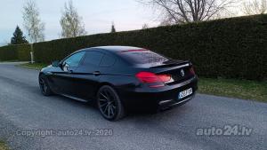 Black BMW 6 Series 2012 in Tallinn, with an engine capacity of 3.00 L and mileage of 305 thousand km for 18500 €, photo 20 on AUTOMOTO.COM.LV