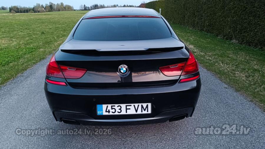 Black BMW 6 Series 2012 in Tallinn, with an engine capacity of 3.00 L and mileage of 305 thousand km for 18500 €, photo 22 on AUTOMOTO.COM.LV