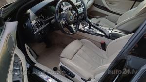 Black BMW 6 Series 2012 in Tallinn, with an engine capacity of 3.00 L and mileage of 305 thousand km for 18500 €, photo 24 on AUTOMOTO.COM.LV