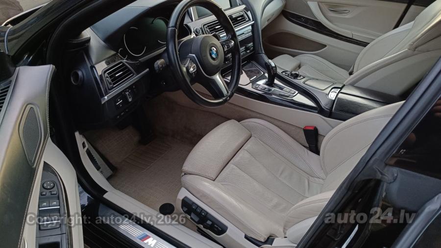 Black BMW 6 Series 2012 in Tallinn, with an engine capacity of 3.00 L and mileage of 305 thousand km for 18500 €, photo 24 on AUTOMOTO.COM.LV