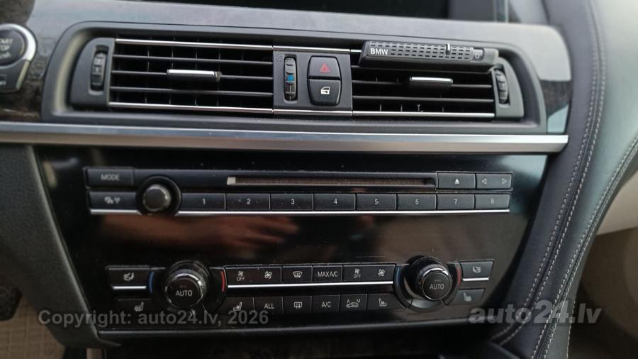 Black BMW 6 Series 2012 in Tallinn, with an engine capacity of 3.00 L and mileage of 305 thousand km for 18500 €, photo 30 on AUTOMOTO.COM.LV
