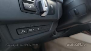 Black BMW 6 Series 2012 in Tallinn, with an engine capacity of 3.00 L and mileage of 305 thousand km for 18500 €, photo 31 on AUTOMOTO.COM.LV