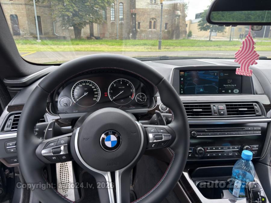 Black BMW 6 Series 2012 in Tallinn, with an engine capacity of 3.00 L and mileage of 422 thousand km for 18000 €, photo 7 on AUTOMOTO.COM.LV